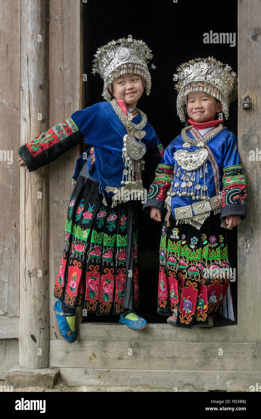 Cute little Long Skirt Miao girls in traditional attire, Langde Shang ...