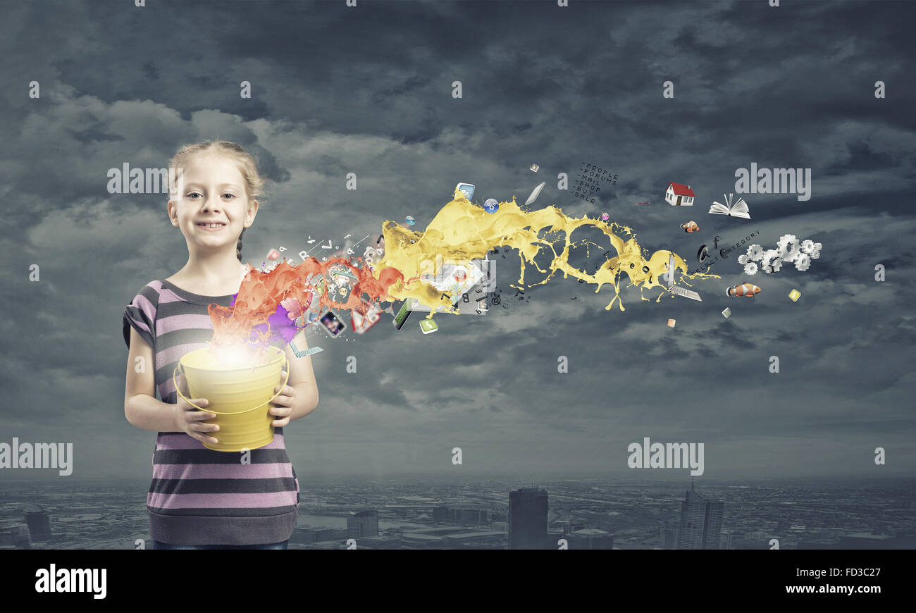 Cute girl with bucket and colorful springs coming out Stock Photo - Alamy