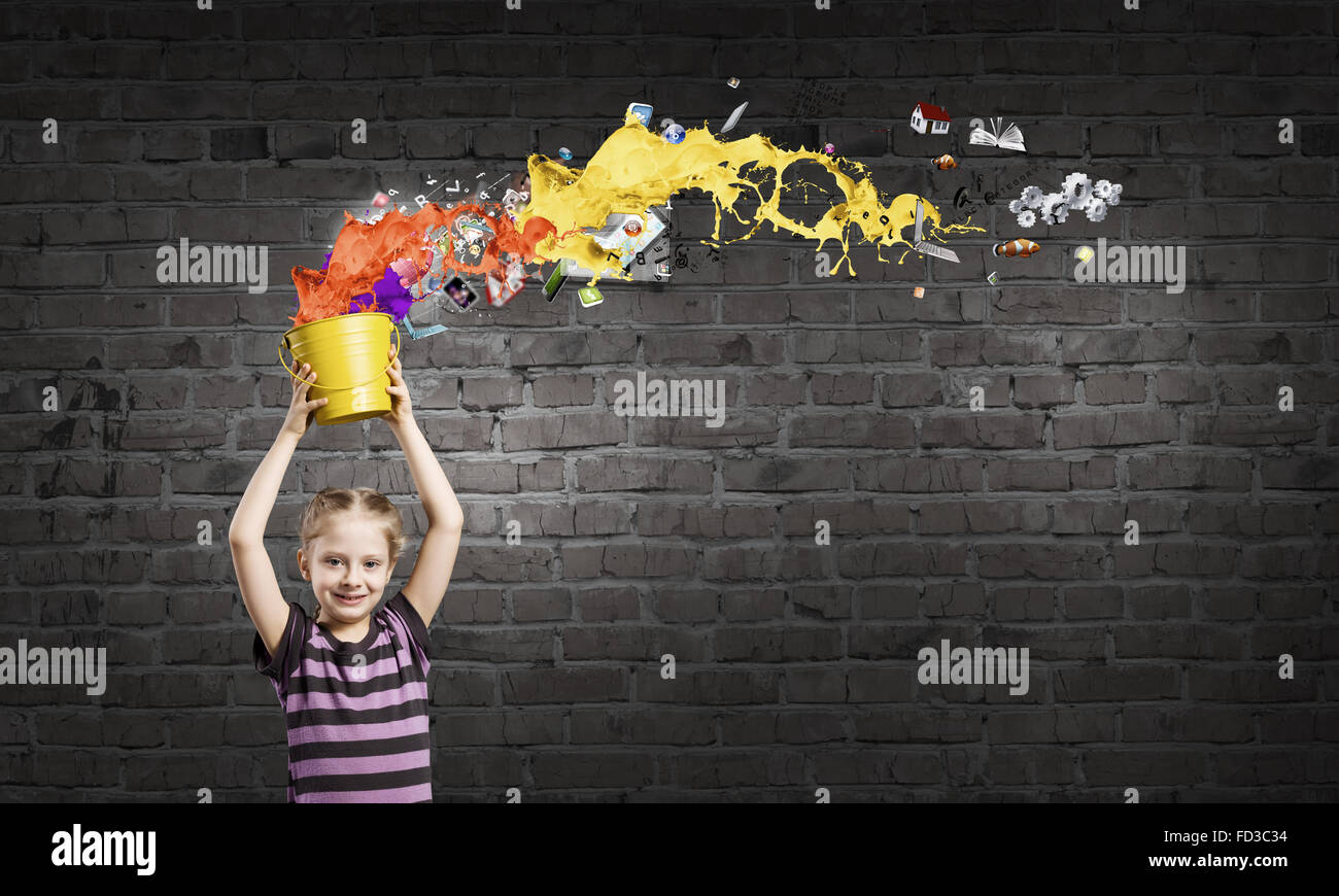 Cute girl with bucket and colorful springs coming out Stock Photo - Alamy