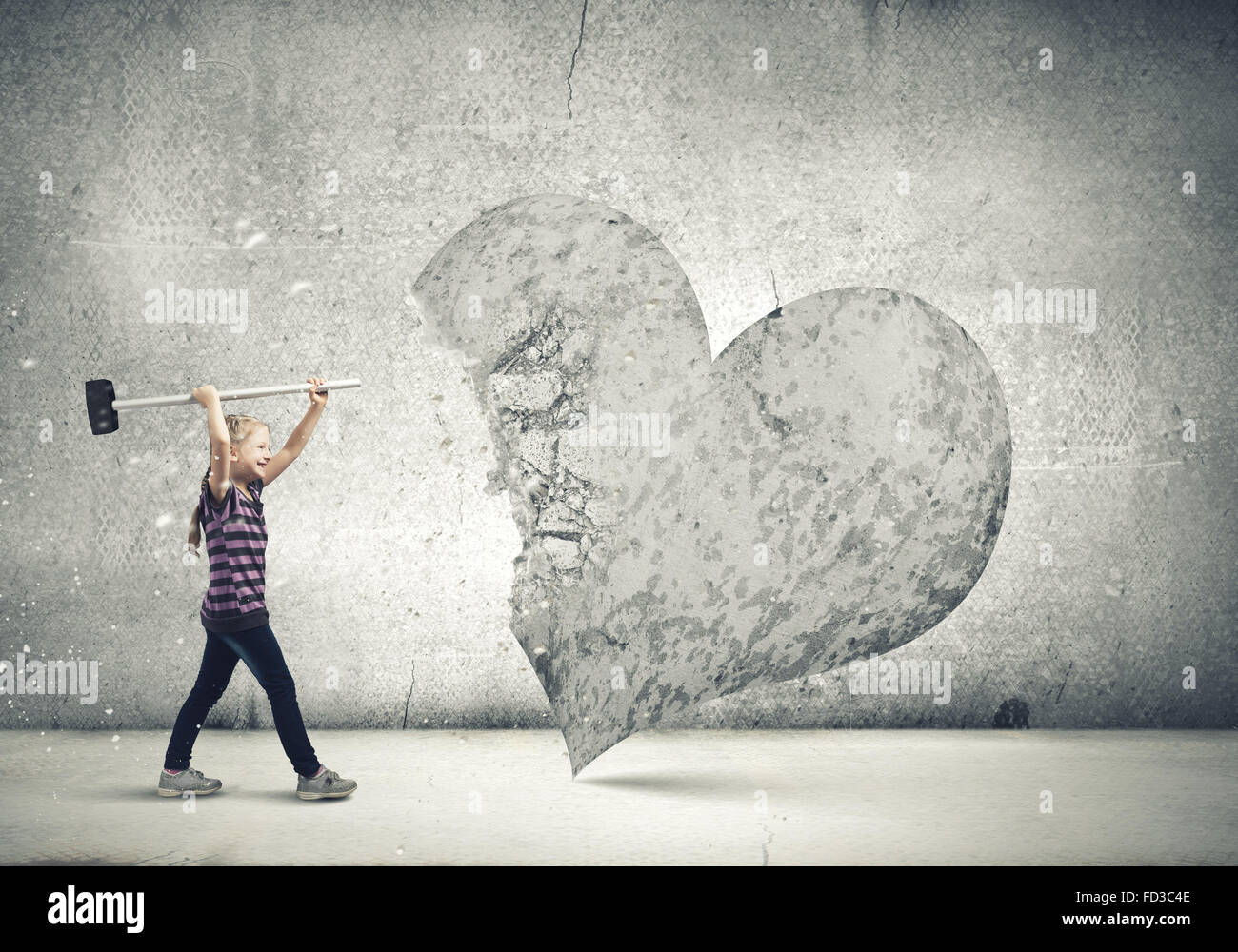 Cute girl breaking stone heart with hammer Stock Photo - Alamy