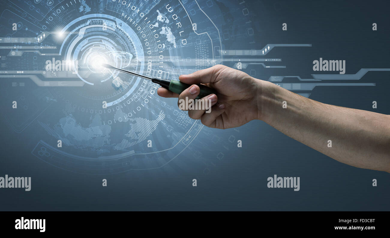 Close up of hand with screwdriver fixing circuit Stock Photo - Alamy