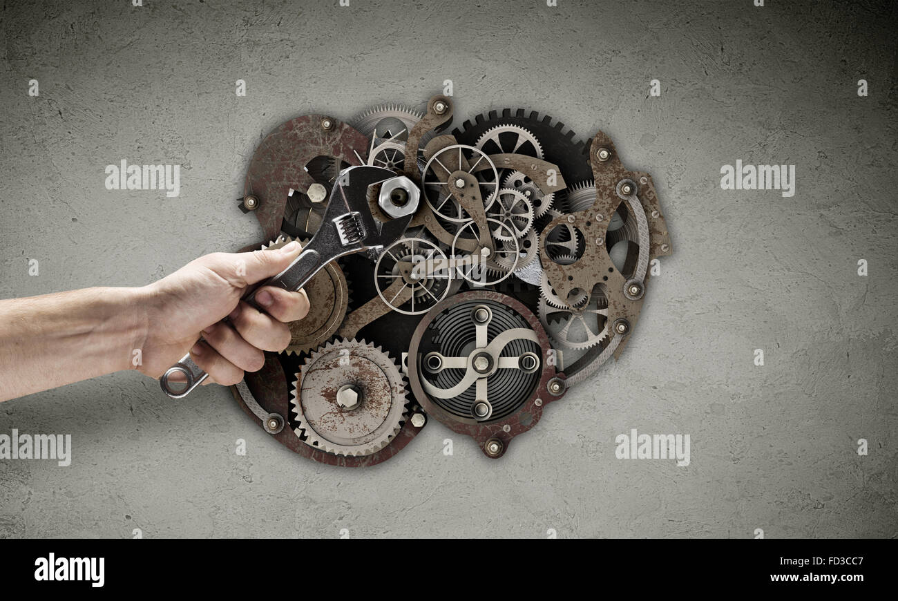 Close up of hand with wrench fixing mechanism Stock Photo - Alamy