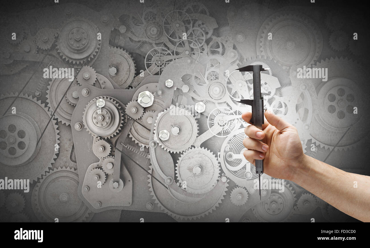 Close up of hand with wrench fixing mechanism Stock Photo - Alamy