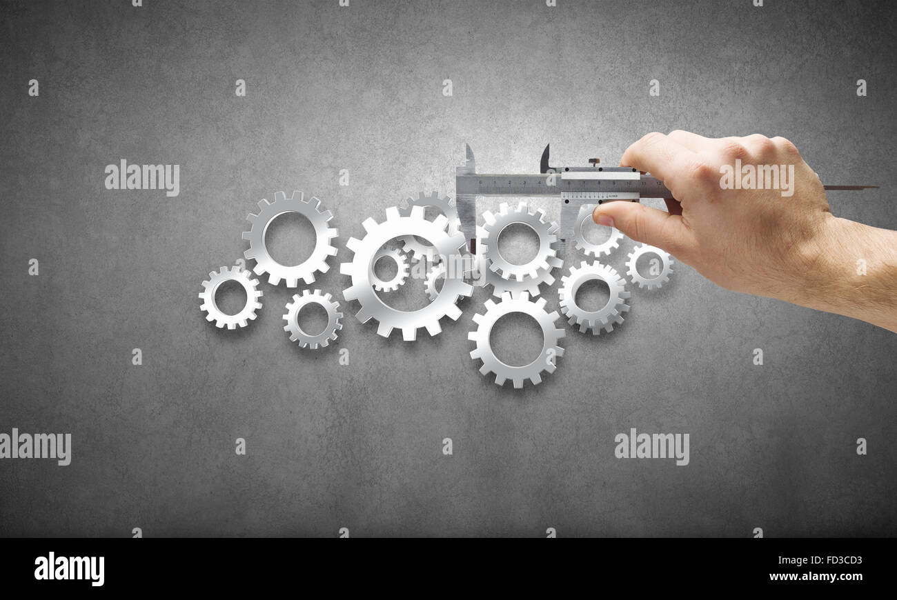 Close up of hand with wrench fixing mechanism Stock Photo - Alamy