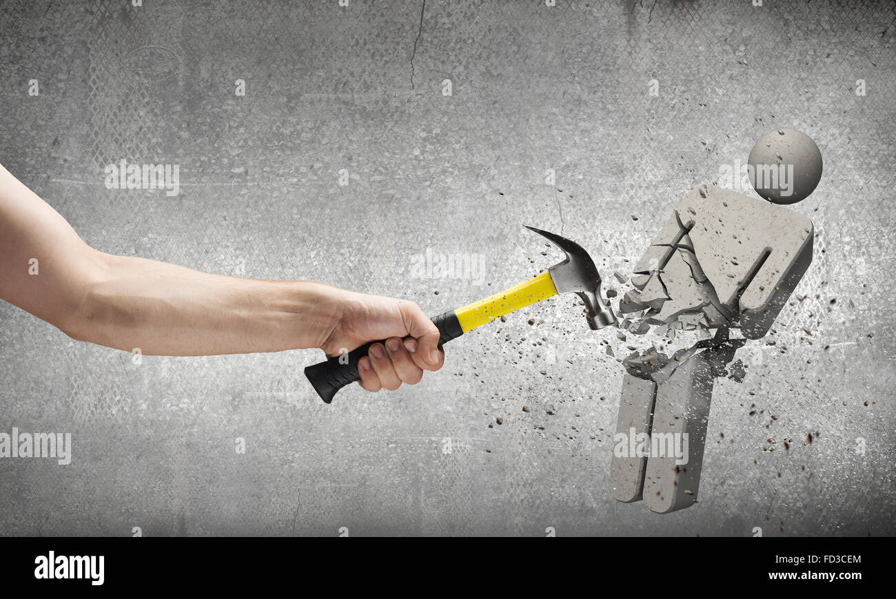 Close up of hammer in human hand breaking stone man figure Stock Photo ...