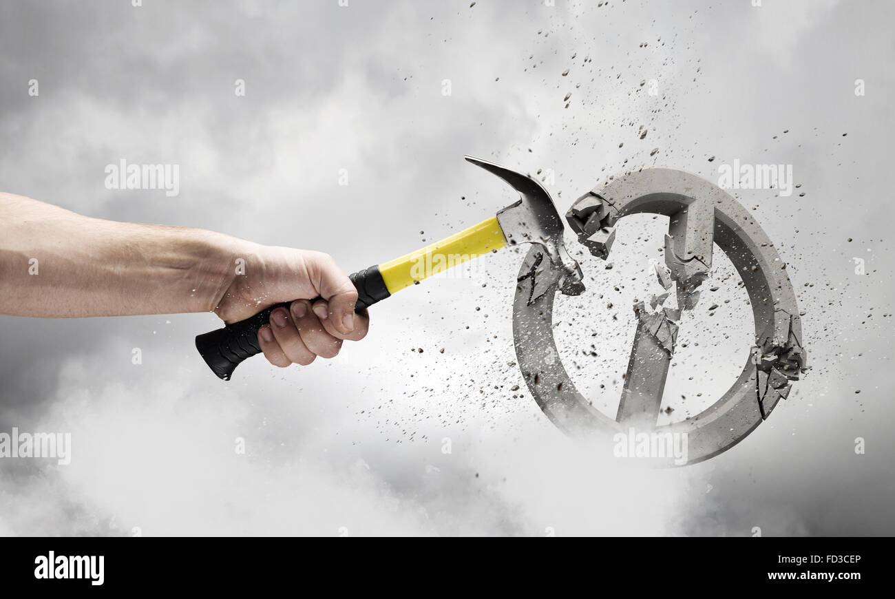 Close up of hammer in human hand breaking stone prohibition mark Stock ...