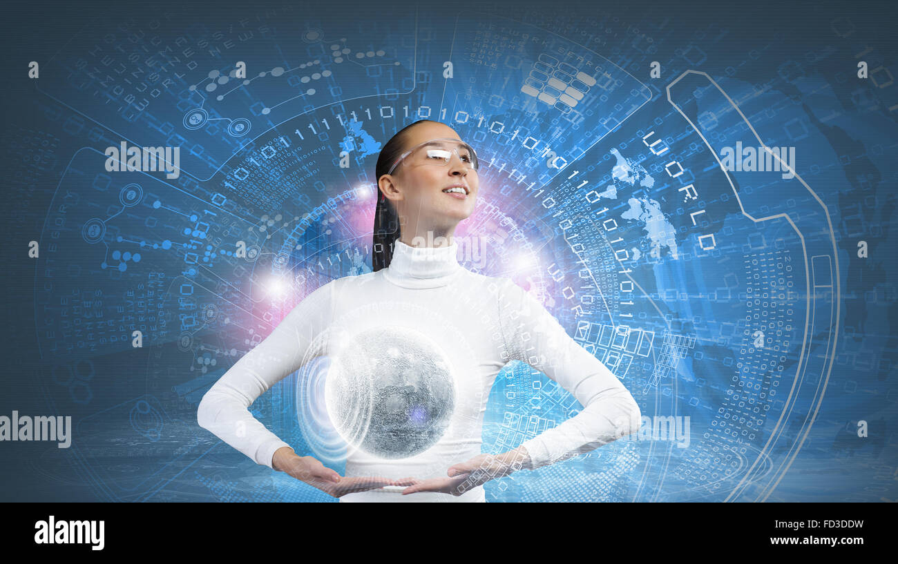 Young woman holding digital Earth planet in hands Stock Photo - Alamy