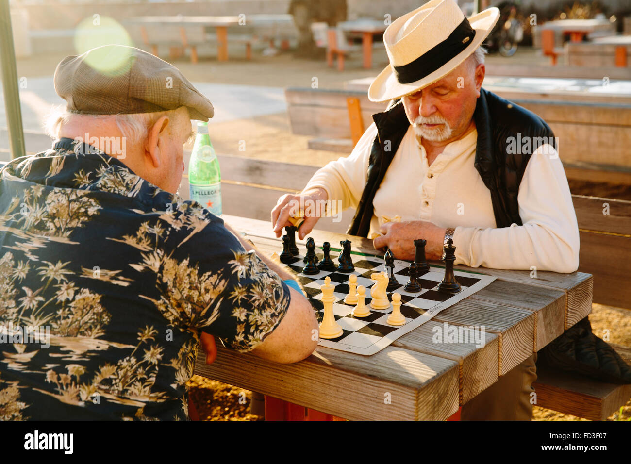 Two men play a game of chess in the original muscle beach park in Santa ...