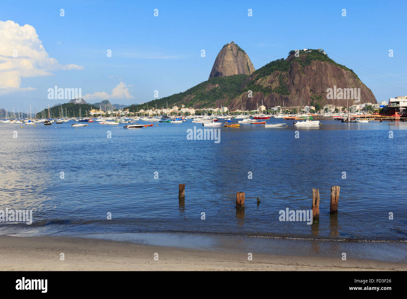 Mountain Sugarloaf and yachts in Guanabara bay from Botafogo beach, Rio ...