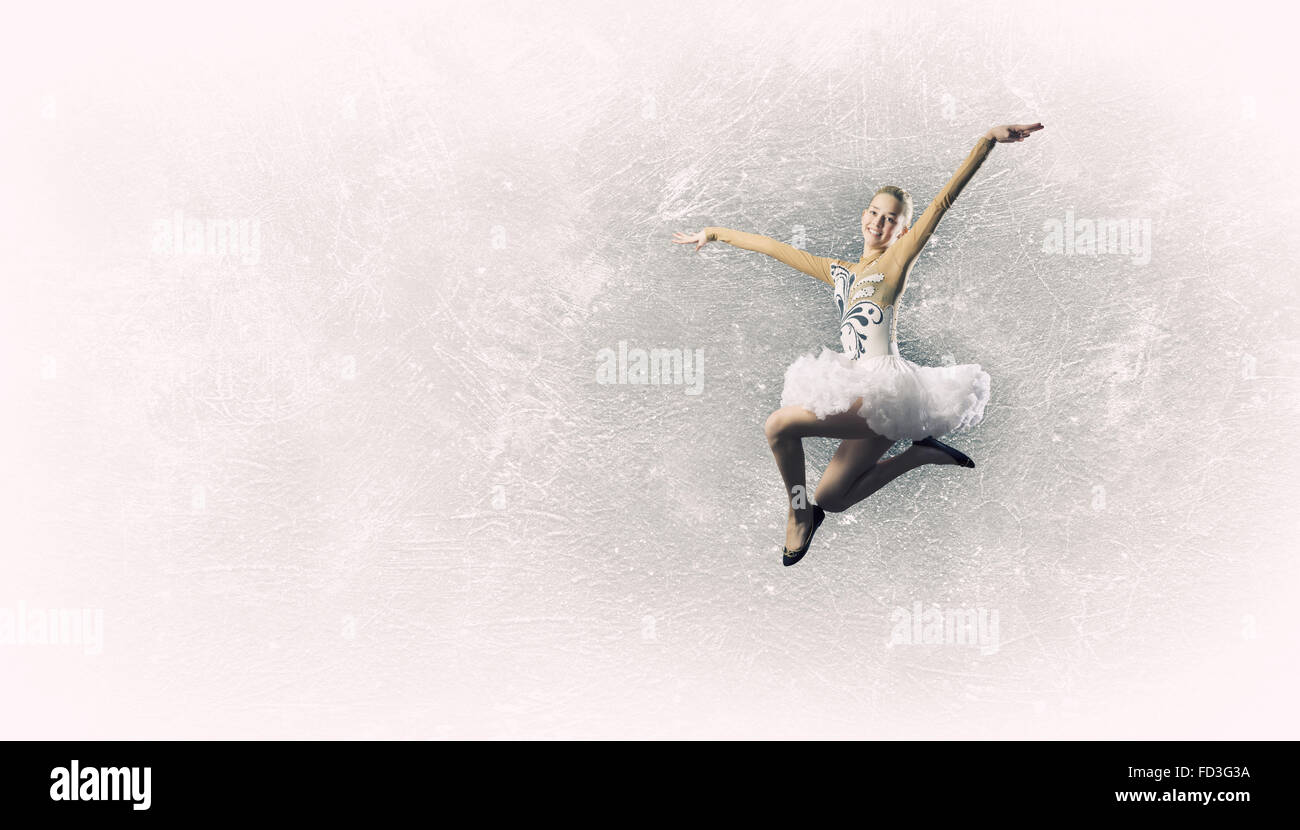 Young pretty ballerina girl making jump in dance Stock Photo - Alamy