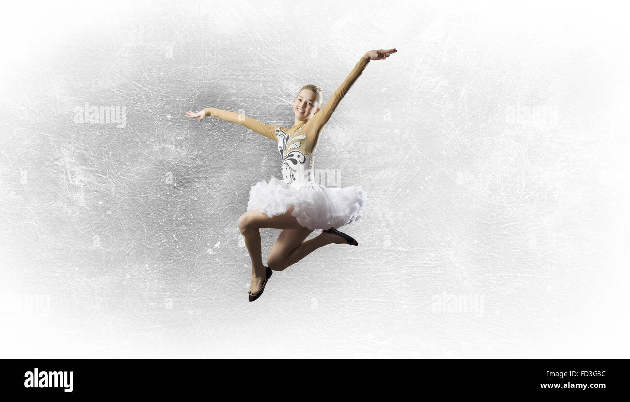 Young pretty ballerina girl making jump in dance Stock Photo - Alamy