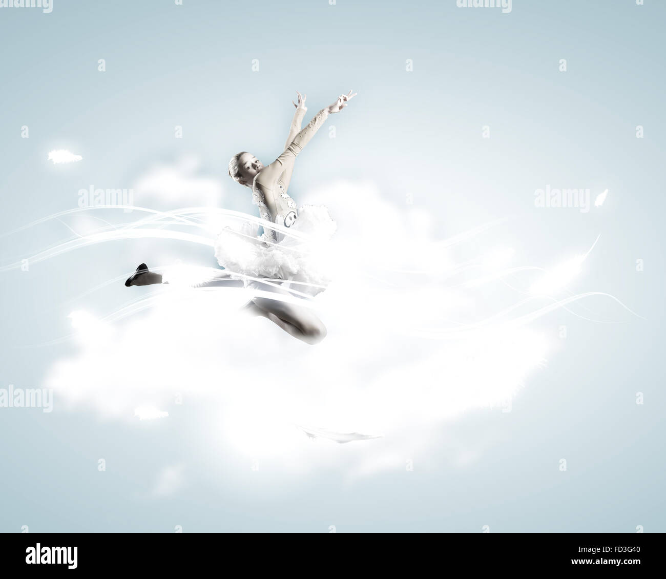 Young pretty ballerina girl making jump in dance Stock Photo - Alamy