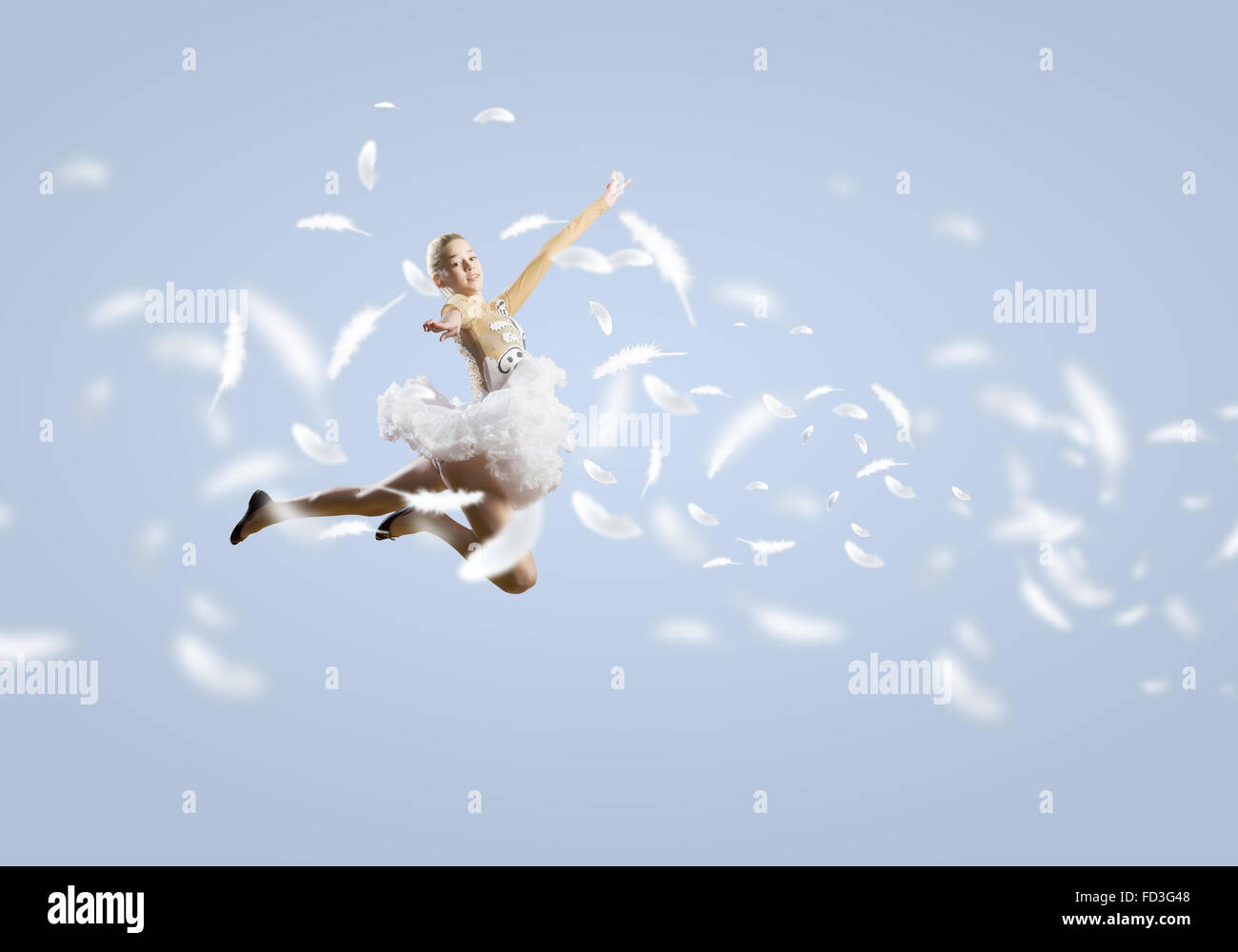 Young pretty ballerina girl making jump in dance Stock Photo - Alamy