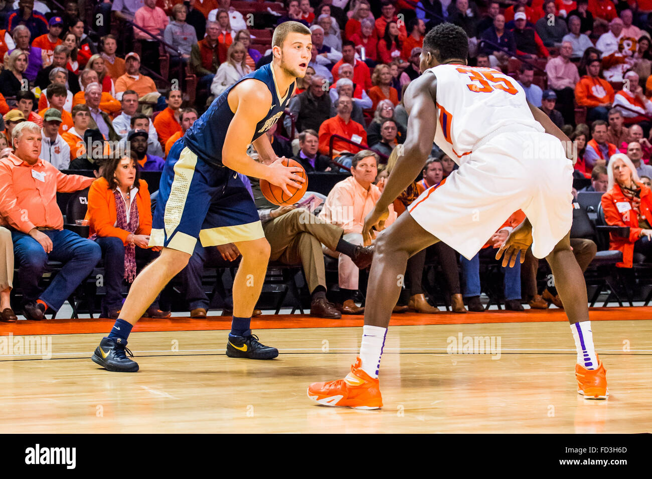 Pittsburgh Panthers forward Ryan Luther (4) defended by Clemson Tigers ...