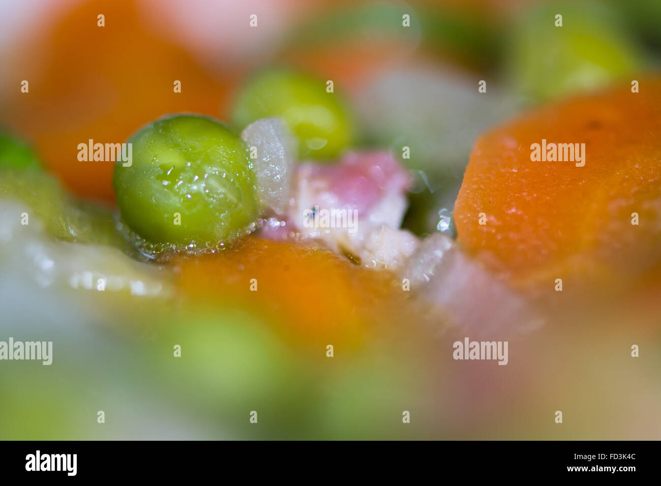Petit pois a la Francaise looking down, detail of ingredients. A ...