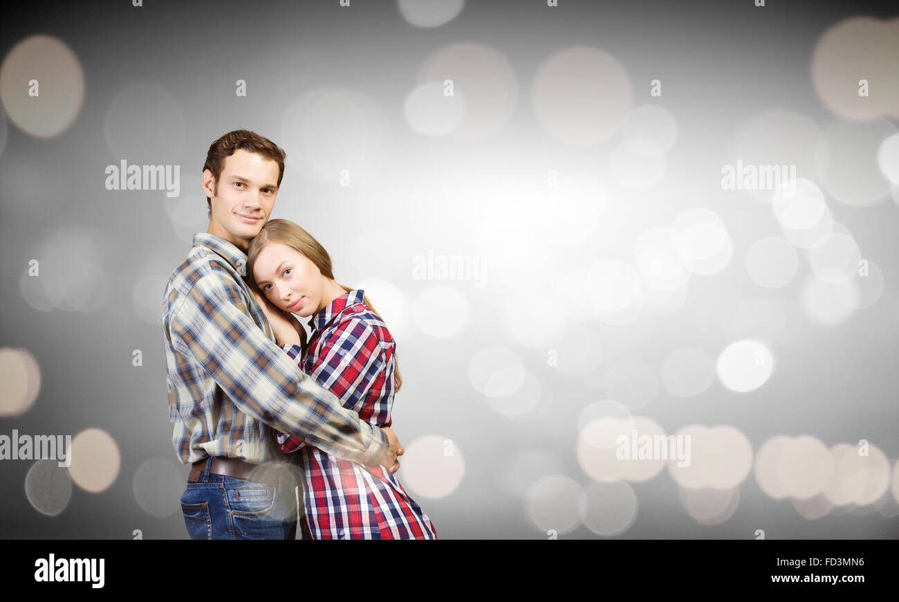 Young happy couple hugging each other tenderly Stock Photo - Alamy