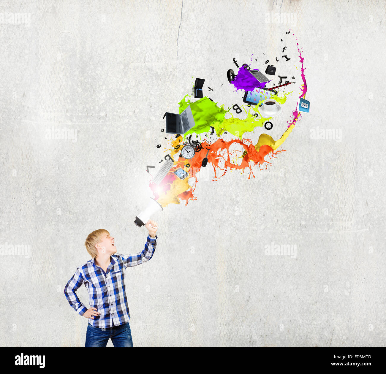 Young man in casual announcing something in megaphone Stock Photo - Alamy