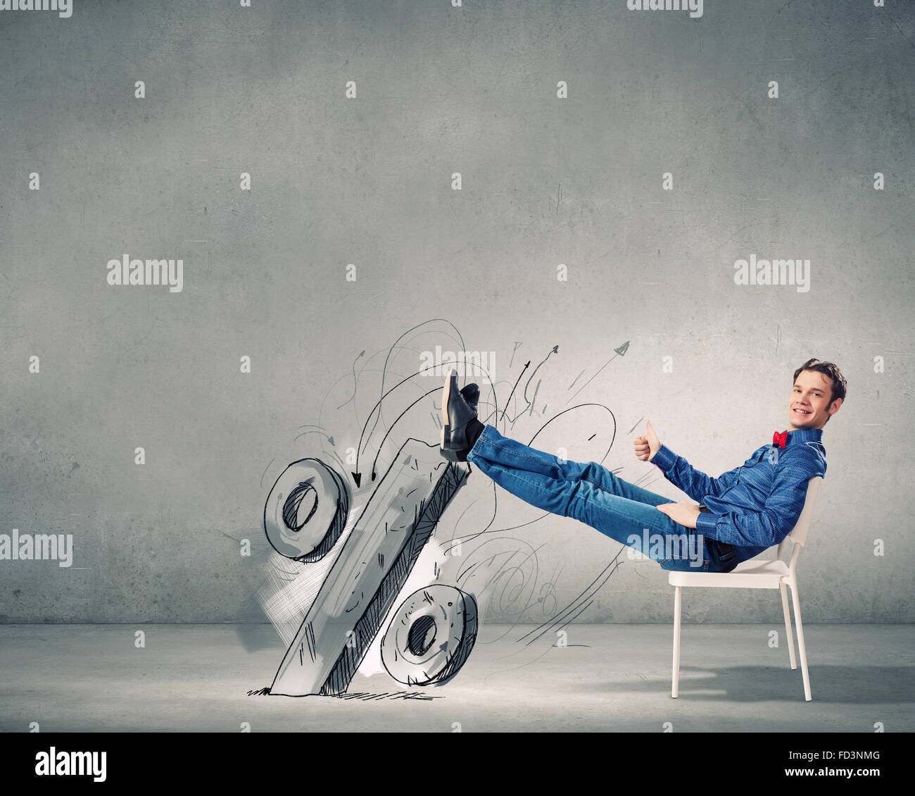 Young man sitting in chair with legs up and relaxing Stock Photo - Alamy