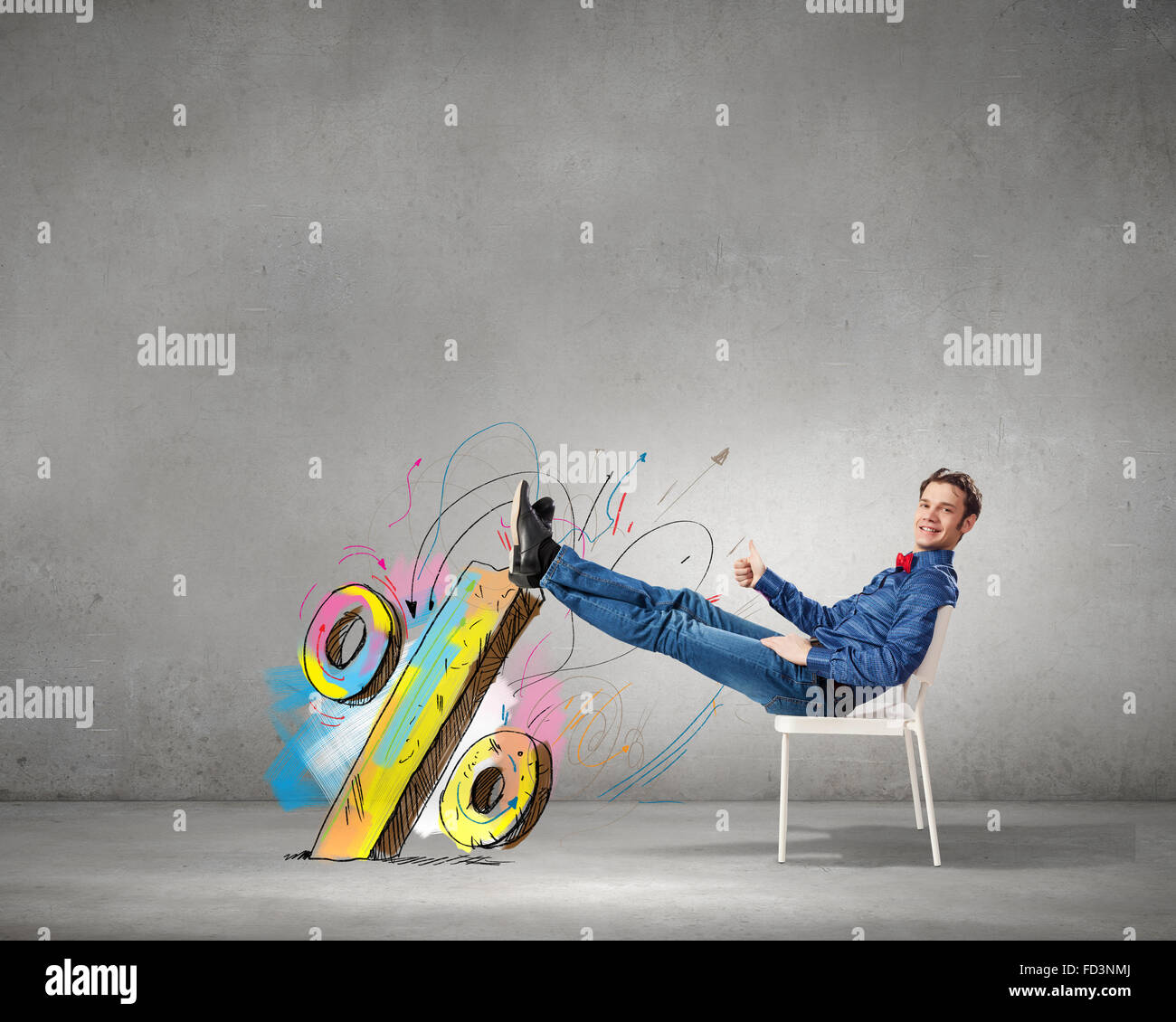 Young man sitting in chair with legs up and relaxing Stock Photo - Alamy