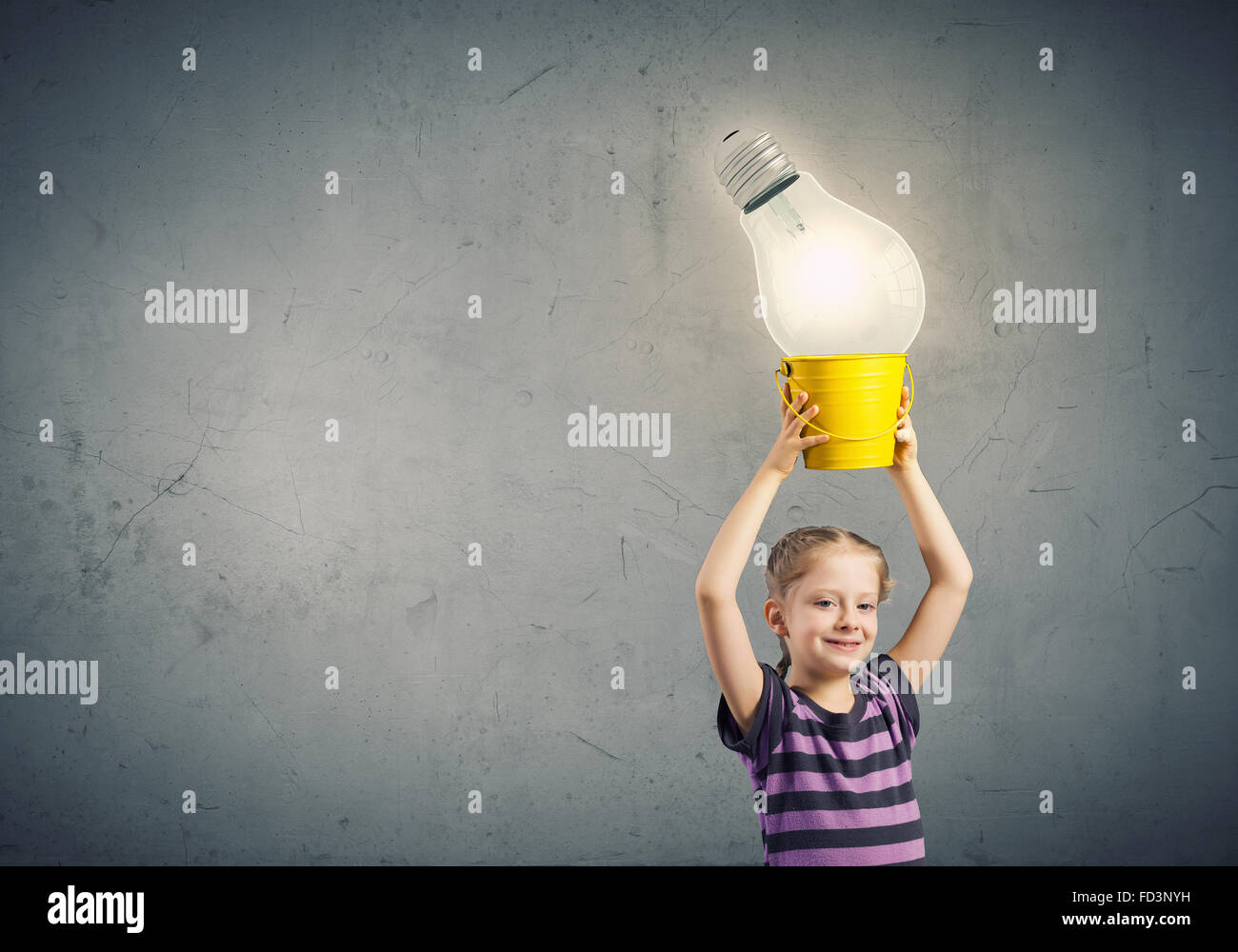 Cute girl with bucket and light bulb in it Stock Photo - Alamy