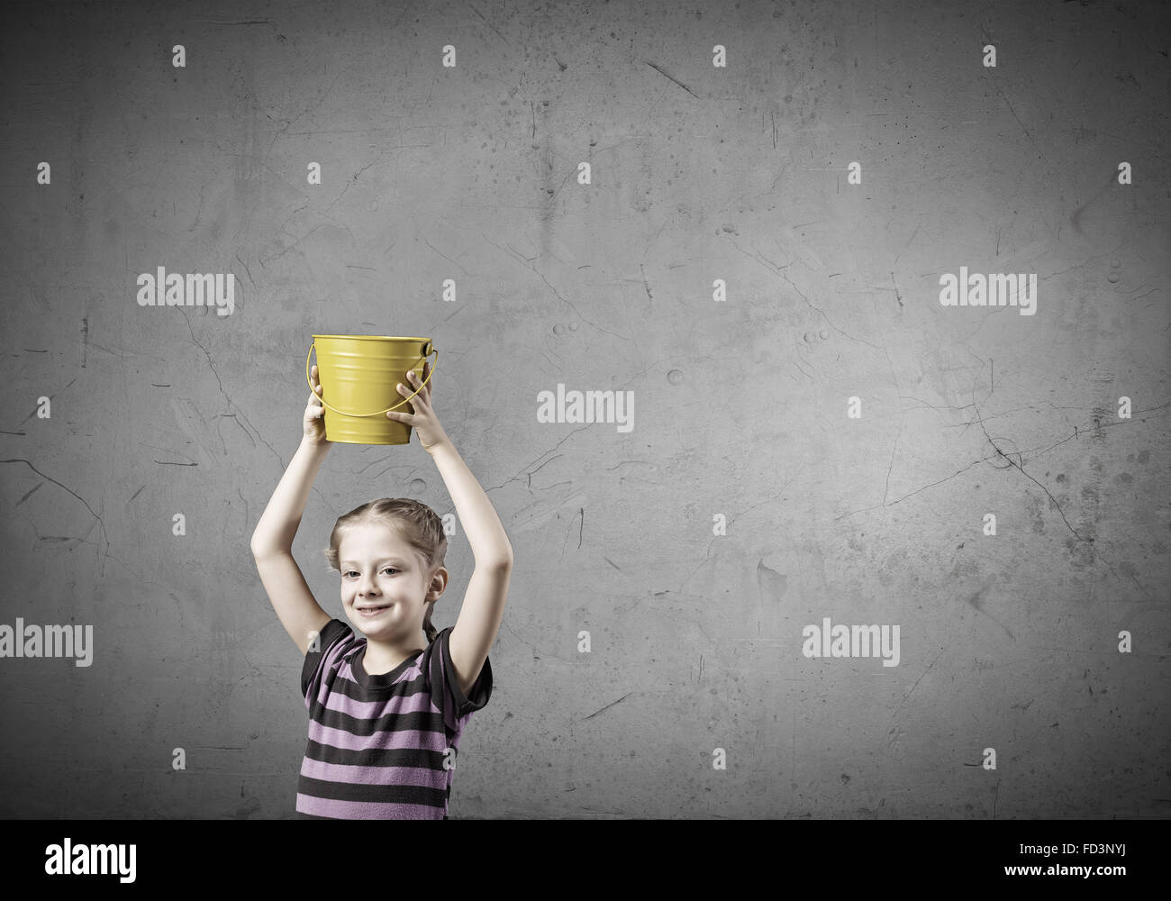 Cute girl with bucket trying to catch the sun Stock Photo - Alamy