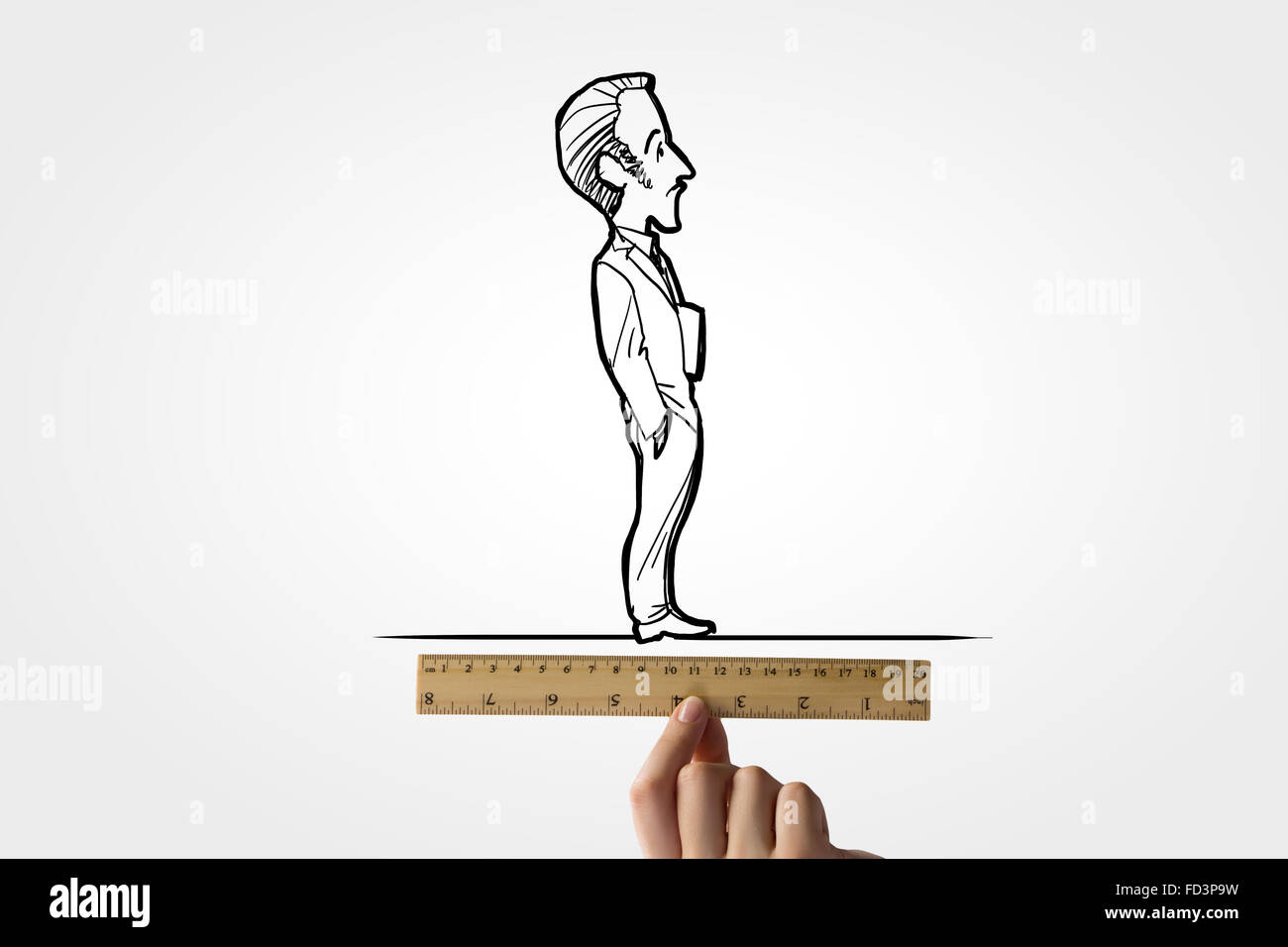 Human hand measuring caricature of businessman with ruler Stock Photo ...