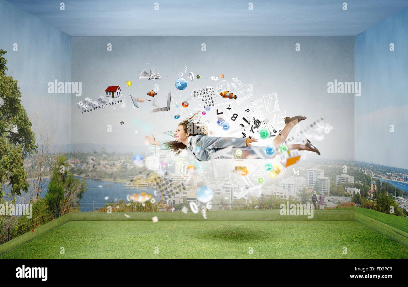 Young woman with megaphone flying in sky and announcing something Stock ...