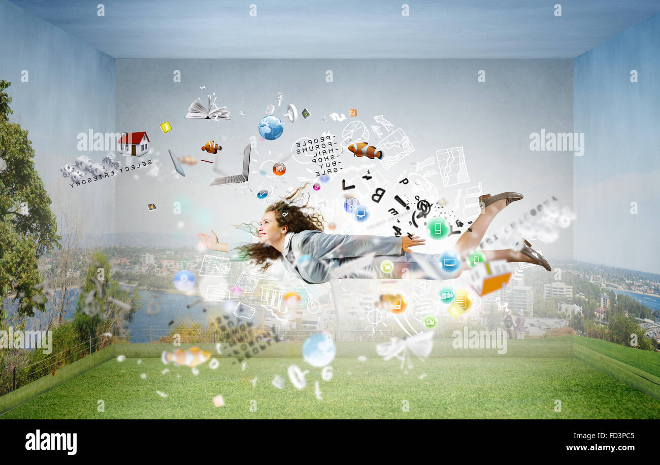 Young woman with megaphone flying in sky and announcing something Stock ...
