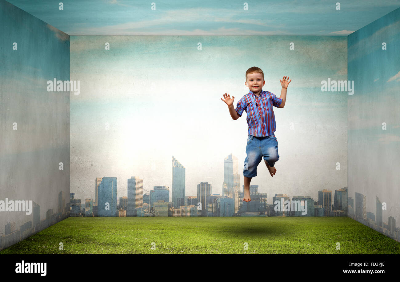 Little cute boy in jump and colorful balloons around Stock Photo - Alamy