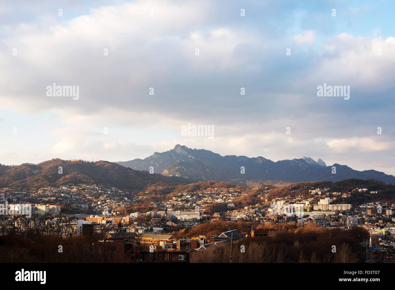 View of Seoul from Naksan park wit houses and mountains Stock Photo - Alamy