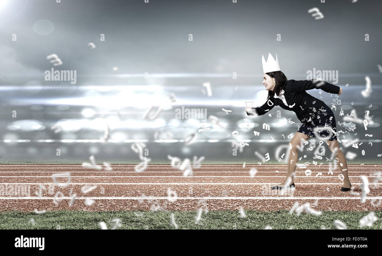 Young businesswoman in paper crown running in a hurry Stock Photo - Alamy