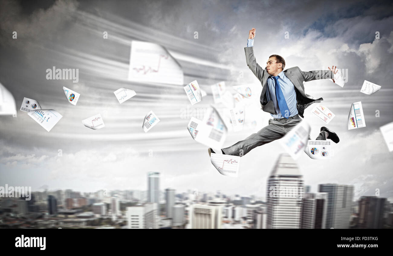Image of a businessman jumping high against financial background Stock ...