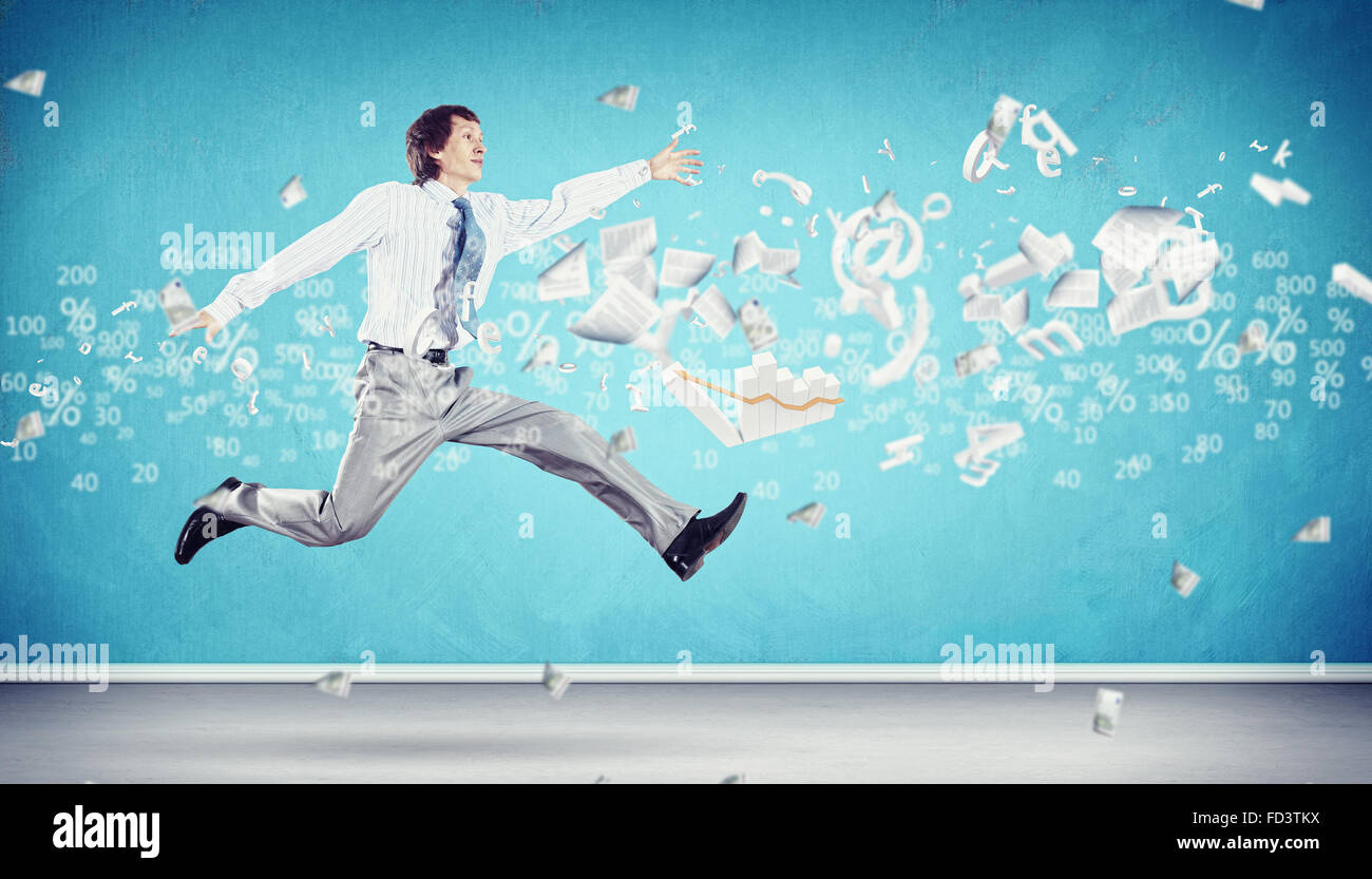 Image of a businessman jumping high against financial background Stock ...