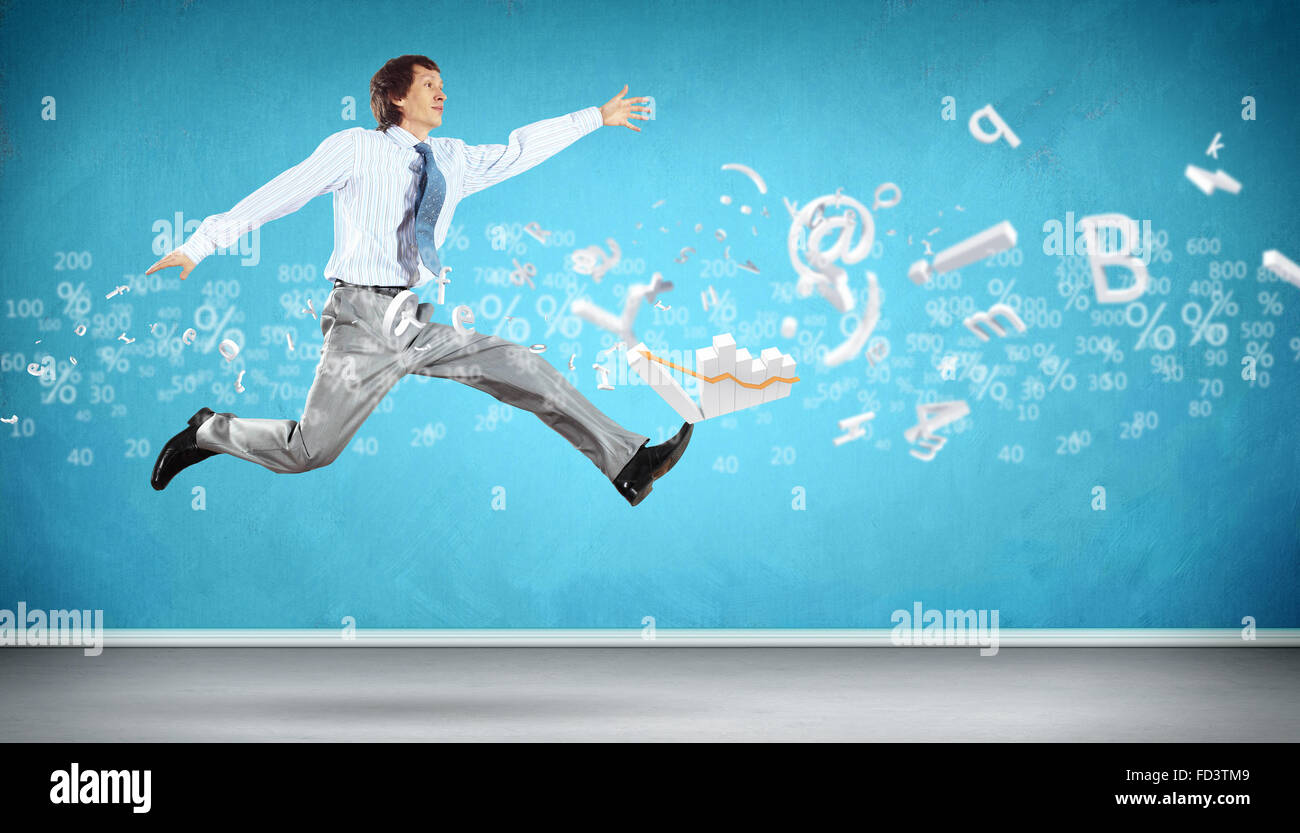 Image of a businessman jumping high against financial background Stock ...