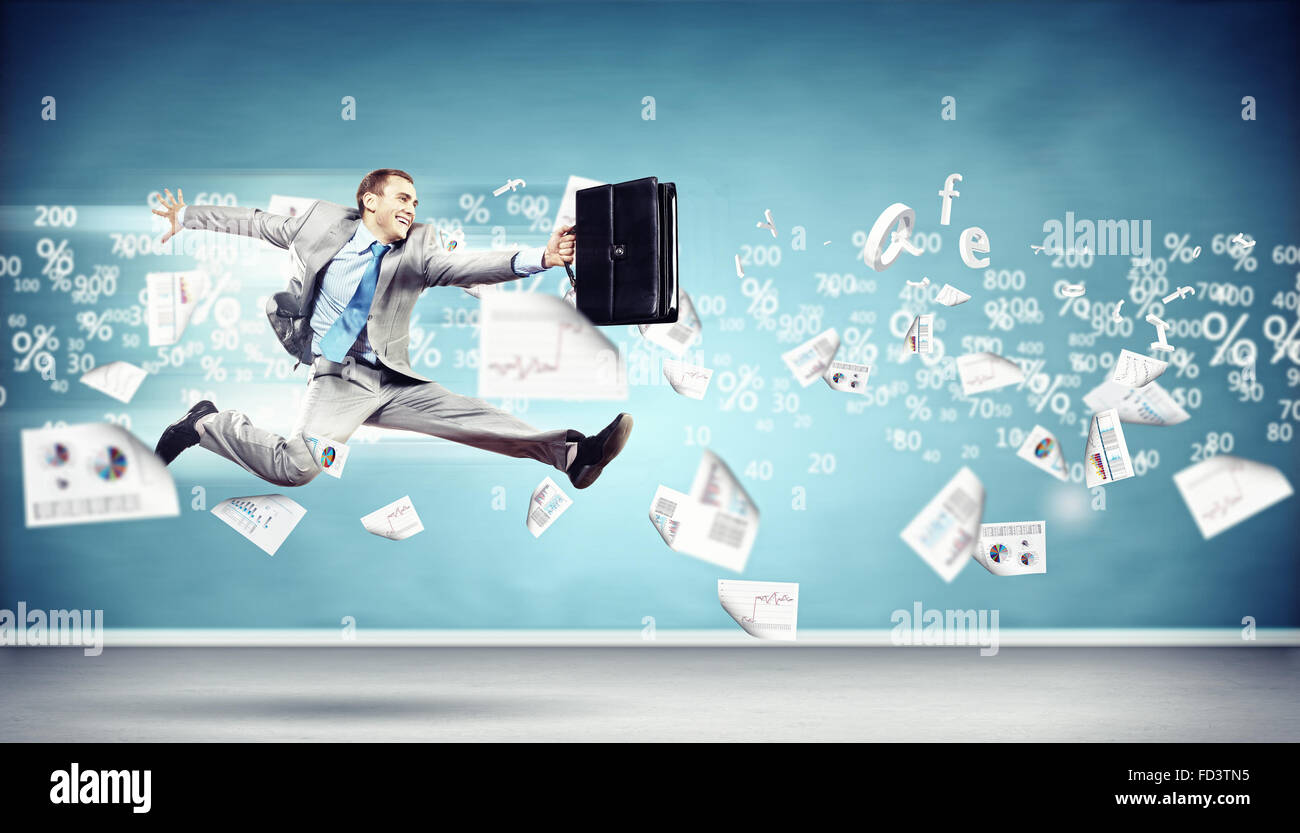 Image of a businessman jumping high against financial background Stock ...