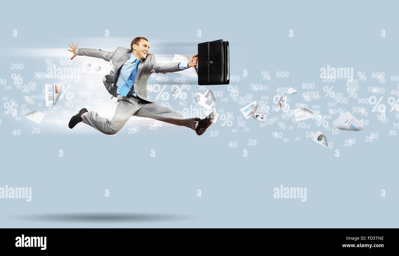 Image of a businessman jumping high against financial background Stock ...