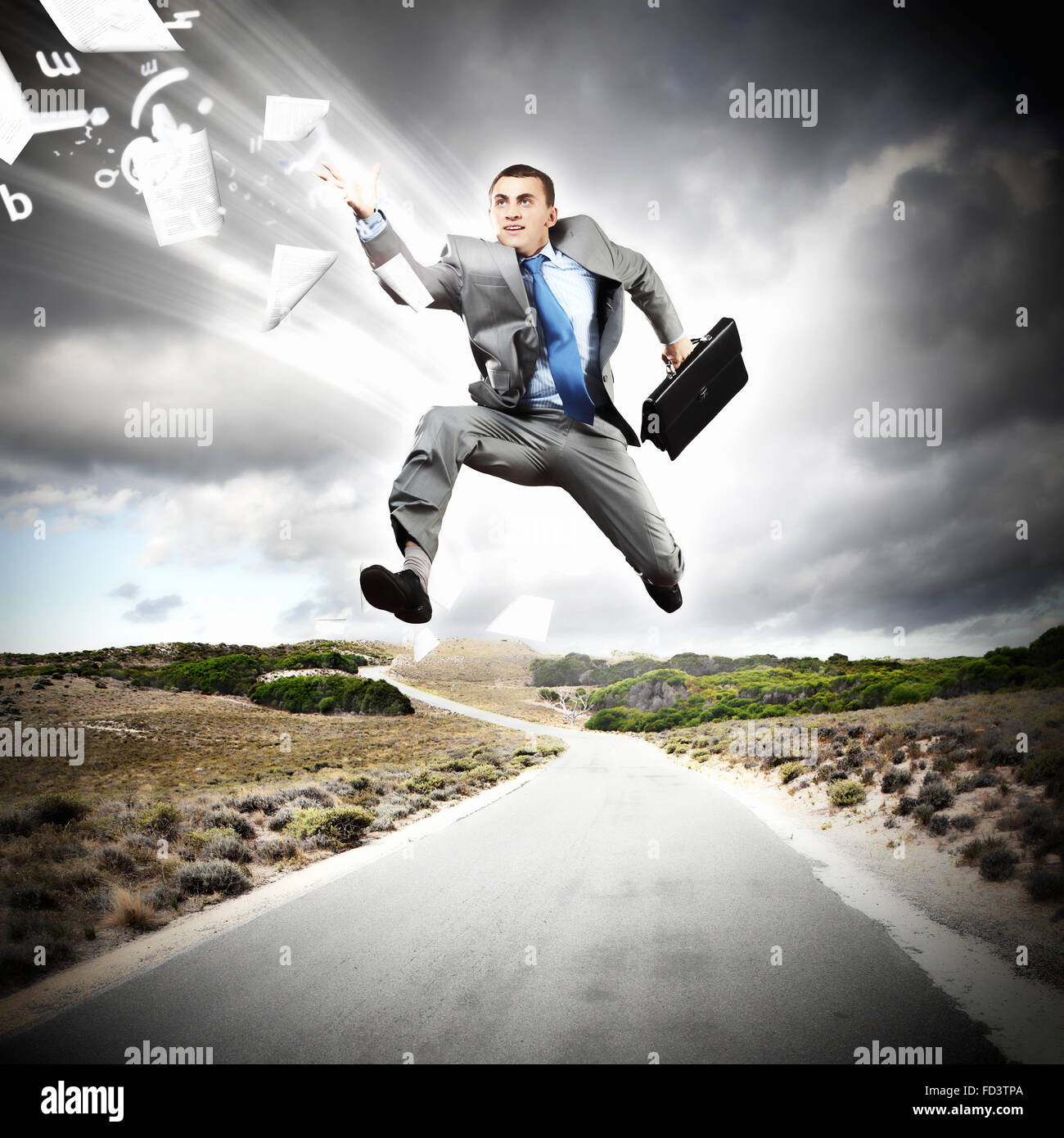 Man in suit running into distance hi-res stock photography and images ...