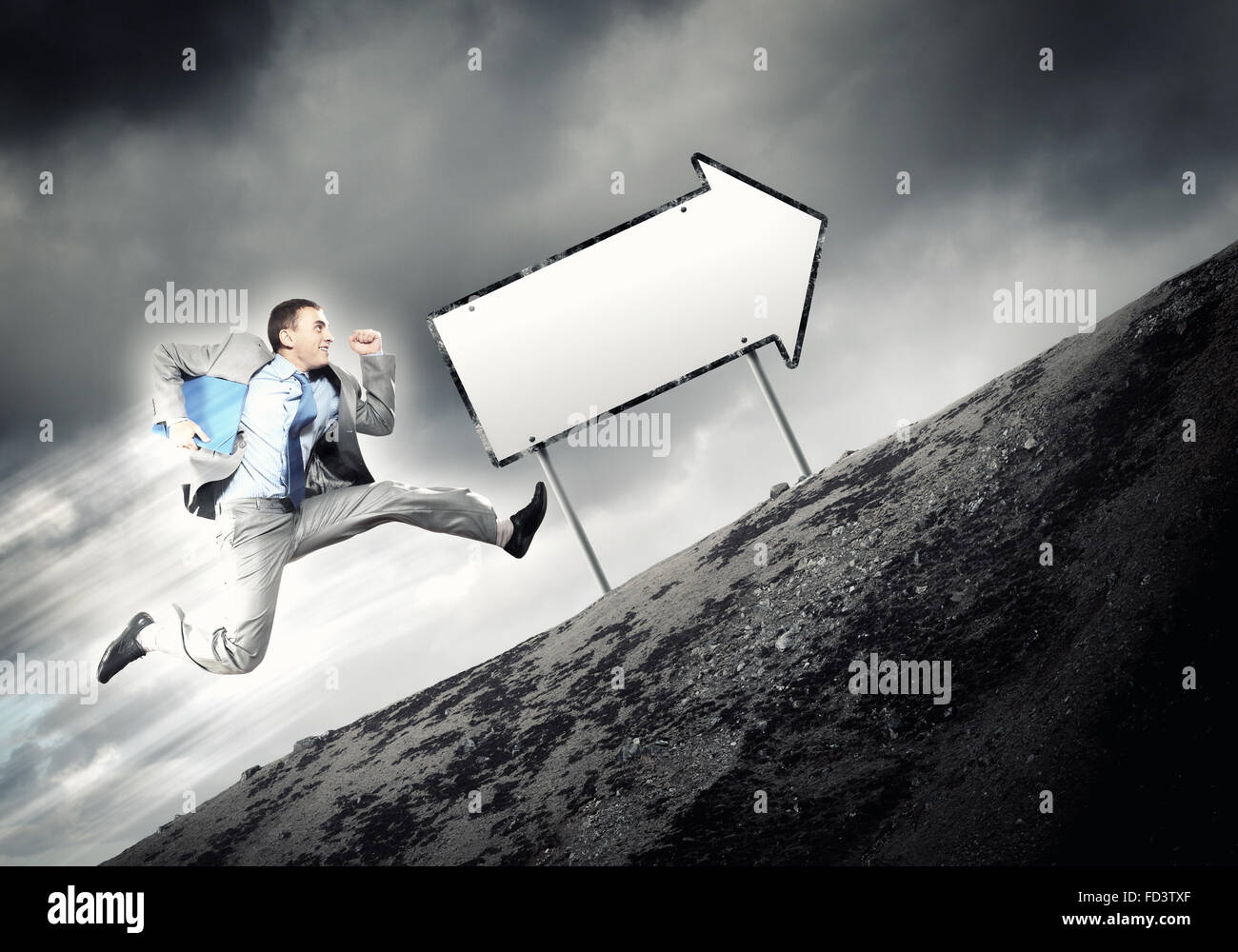 Young businessman in suit running on the road Stock Photo - Alamy