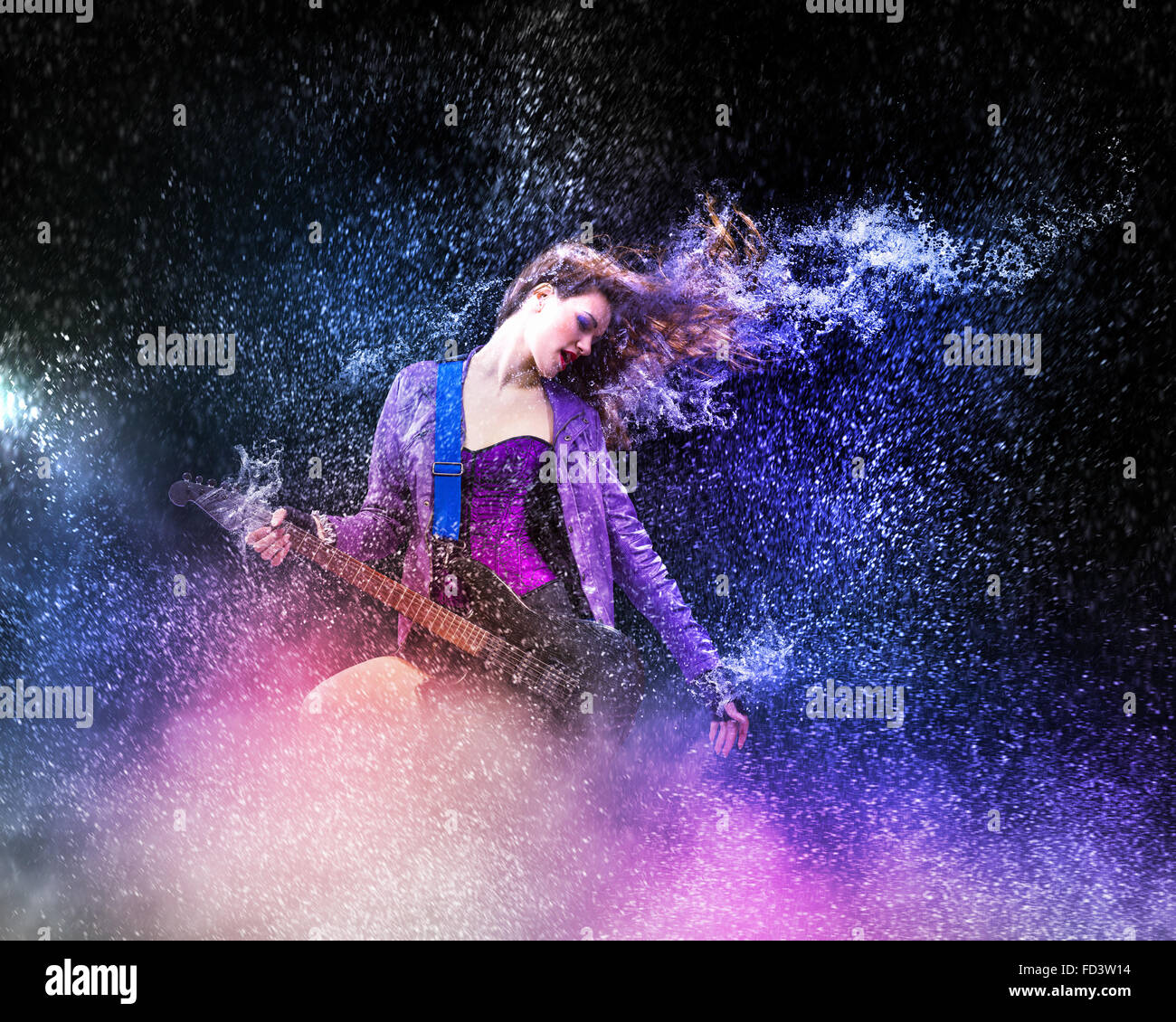 Young attractive rock girl playing the electric guitar Stock Photo - Alamy