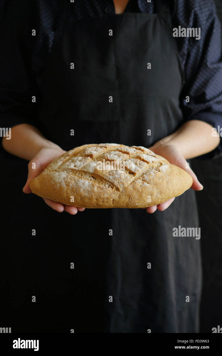 Bread and hands hi-res stock photography and images - Alamy