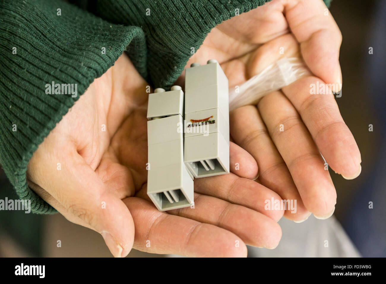 Dragon Quest fans collect blocks from a giant Lego wall mural on ...