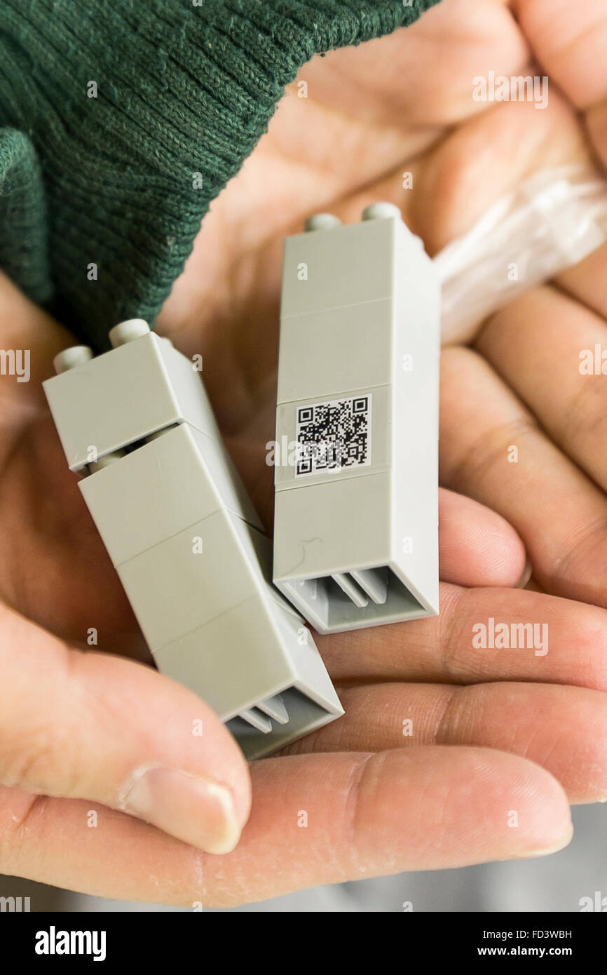 Dragon Quest fans collect blocks from a giant Lego wall mural on ...