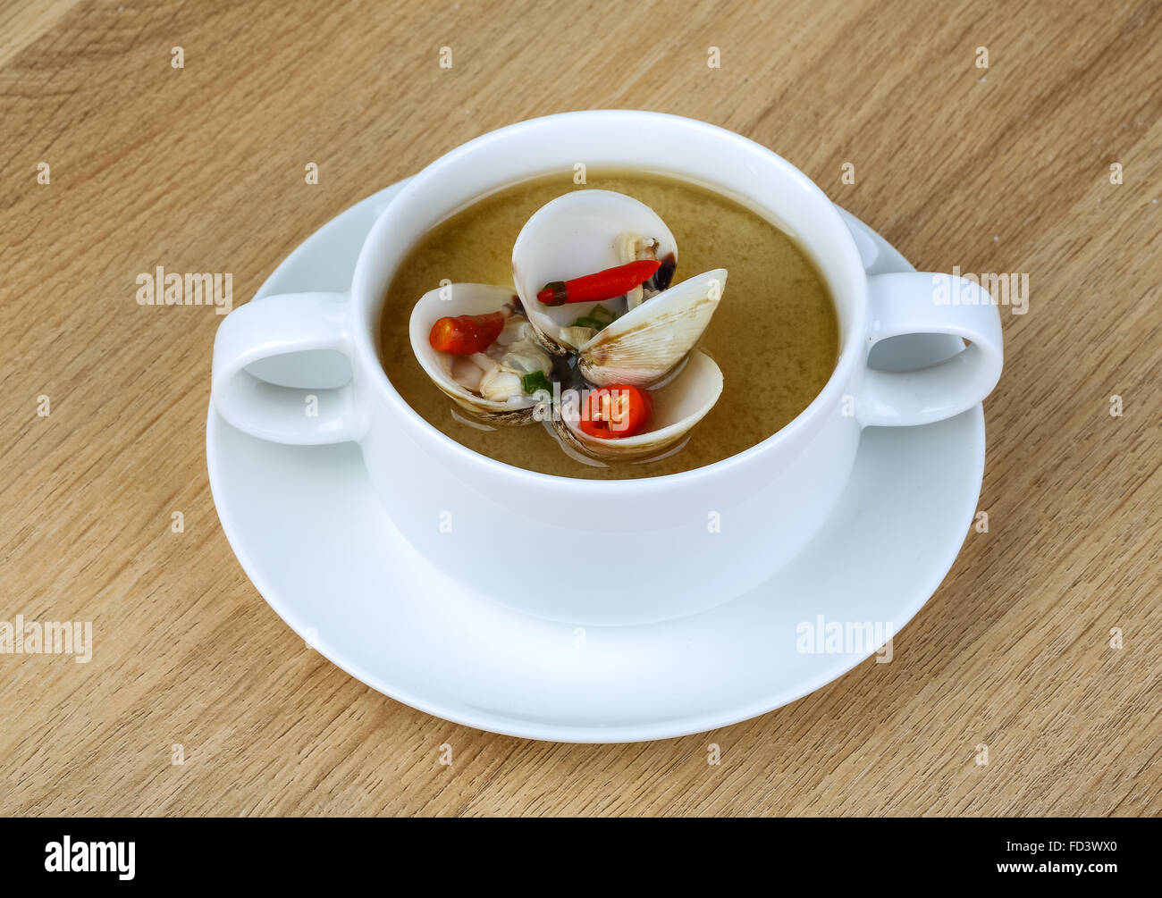 Asian traditional Shell soup on the wood background Stock Photo - Alamy