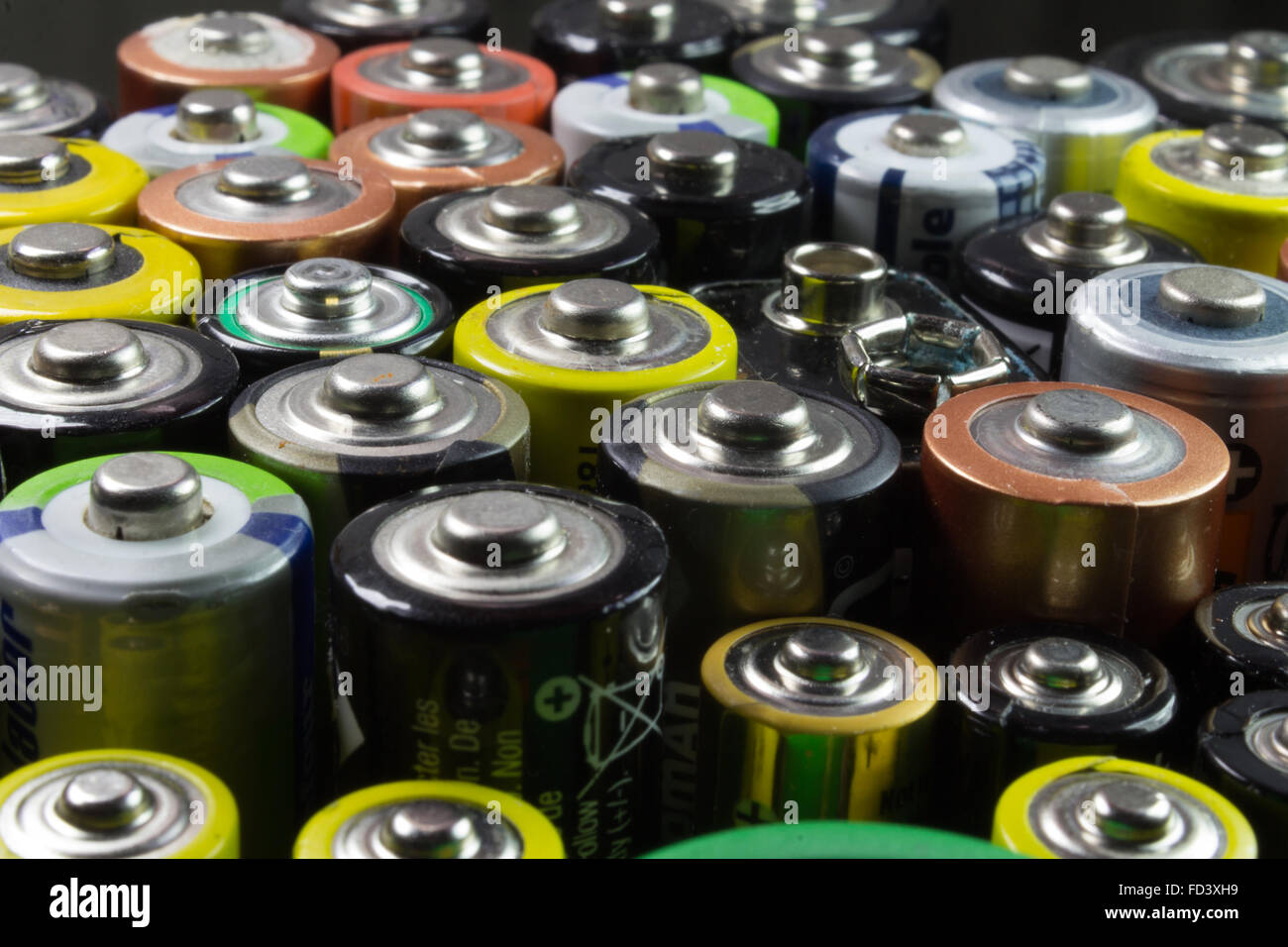 Batteries of different types and colors Stock Photo - Alamy