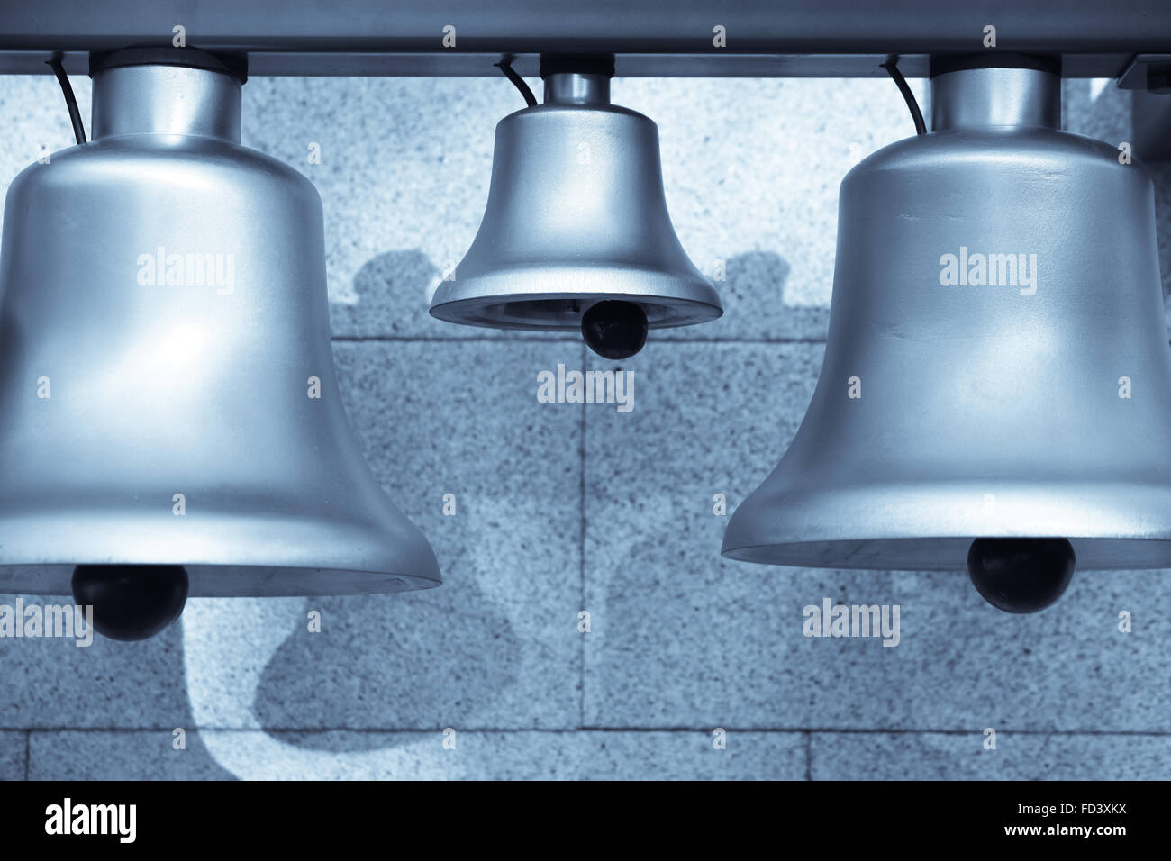 Color image of some various sized bells in a row Stock Photo - Alamy