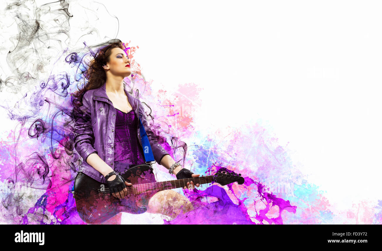 Young attractive rock girl playing the electric guitar Stock Photo - Alamy