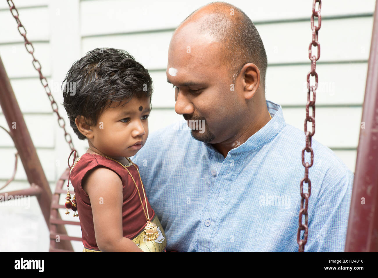 Indian family portrait outside hi-res stock photography and images - Alamy
