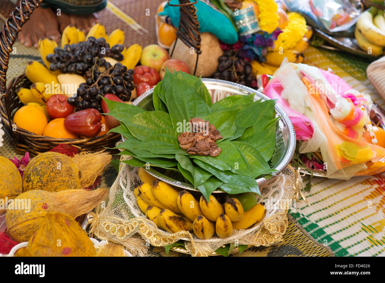Traditional Indian Hindu religious praying items in ear piercing ...