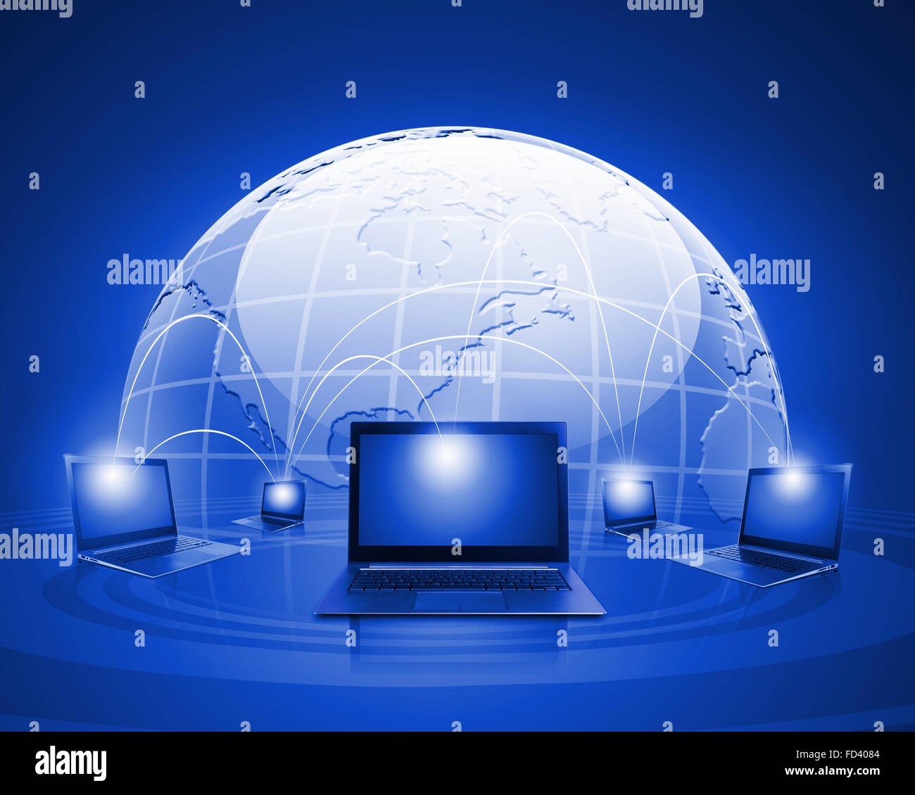 Laptops against world map background. Connection and cooperation Stock ...
