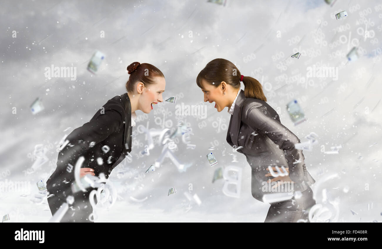 Two businesswomen fighting in office hi-res stock photography and ...